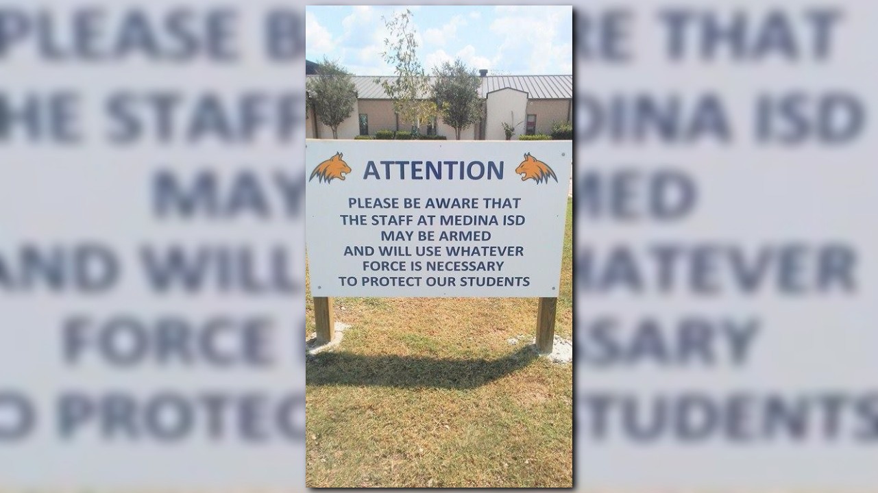 Sign warns of armed staff members at Medina schools | wusa9.com