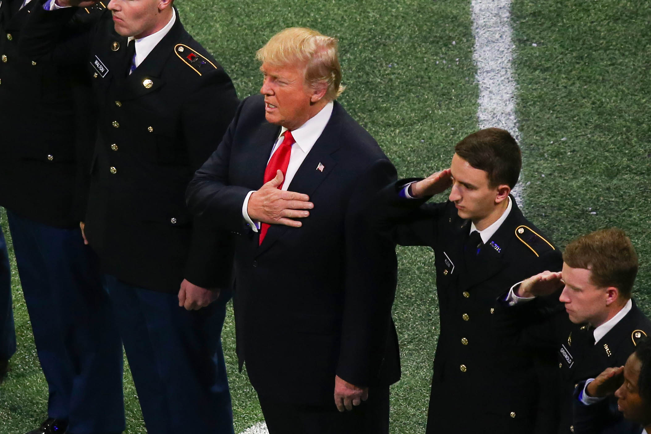 Trump takes field at college football championship game | kens5.com
